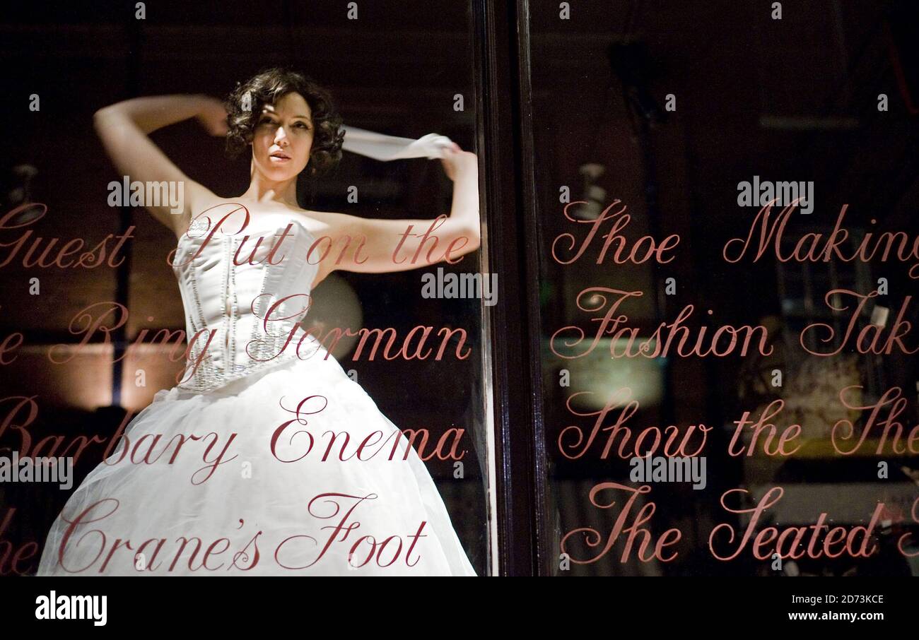 Burlesque dancers perform live in the window of Coco de Mer in Covent ...