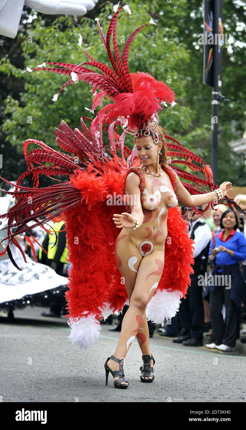 Eds Note Contains Nudity Revellers Follow Floats At The Notting