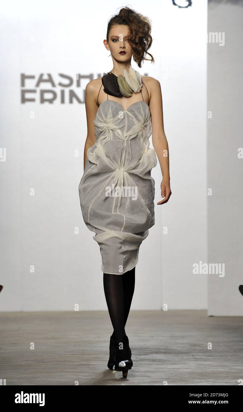 A model on the catwalk at the Fashion Fringe fashion show, featuring ...