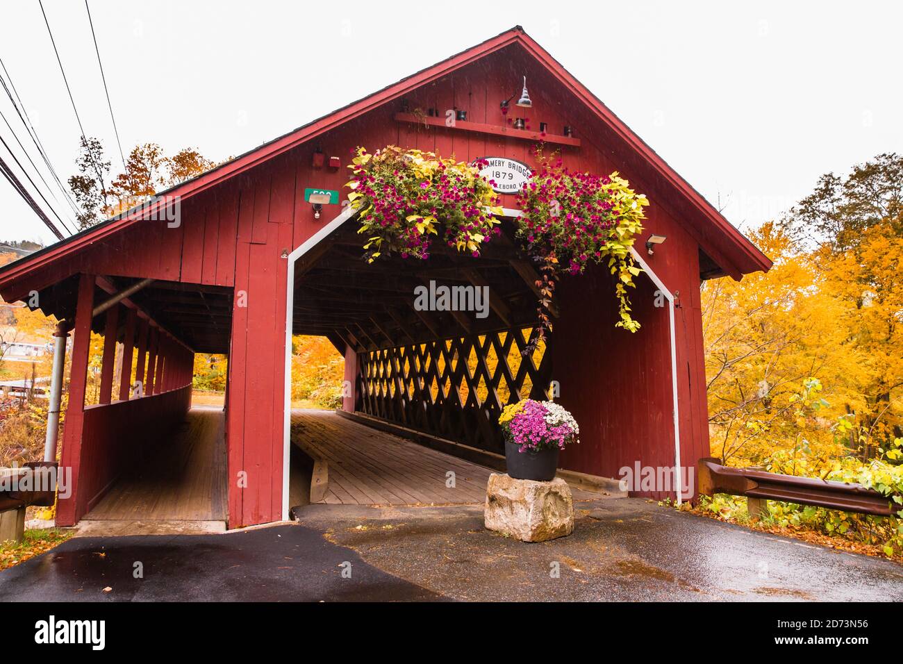 Beautiful Vermont covered bridge surrounded by colorful fall foliage ...