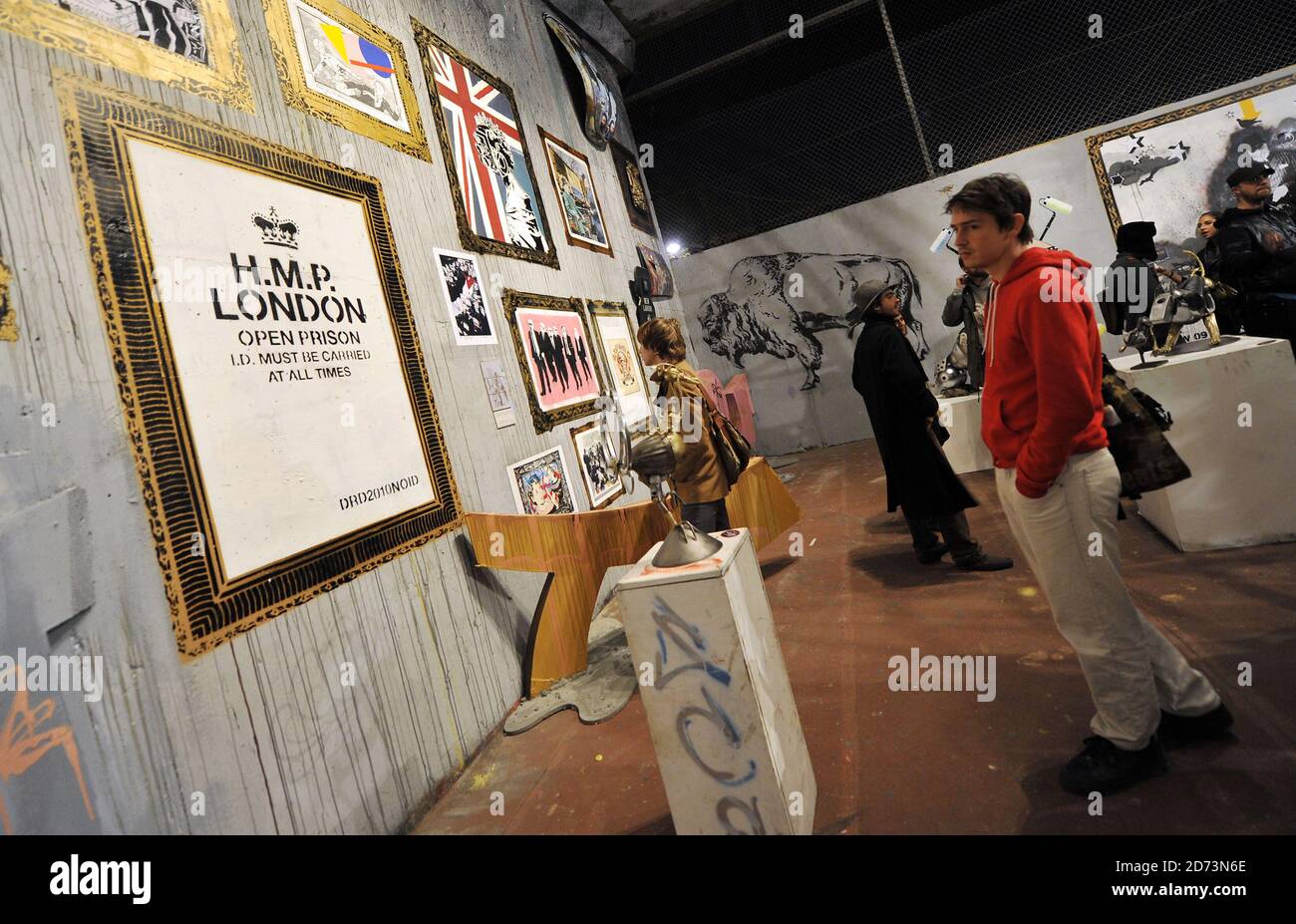 Guests look at exhibits on display at 'Mutate Britain Ð One Foot in the ...