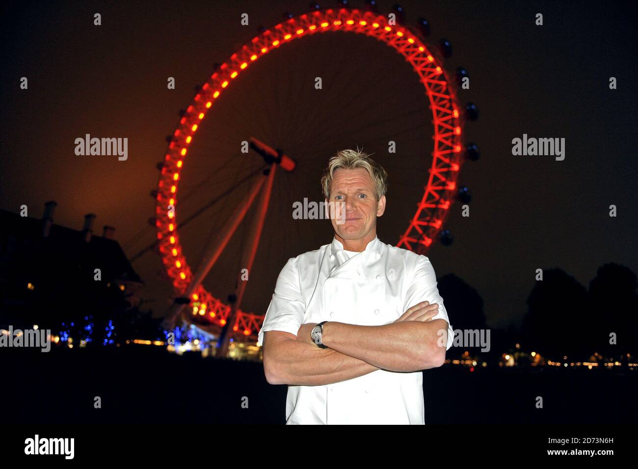 Gordon Ramsay poses for photographs in front of the London Eye in ...