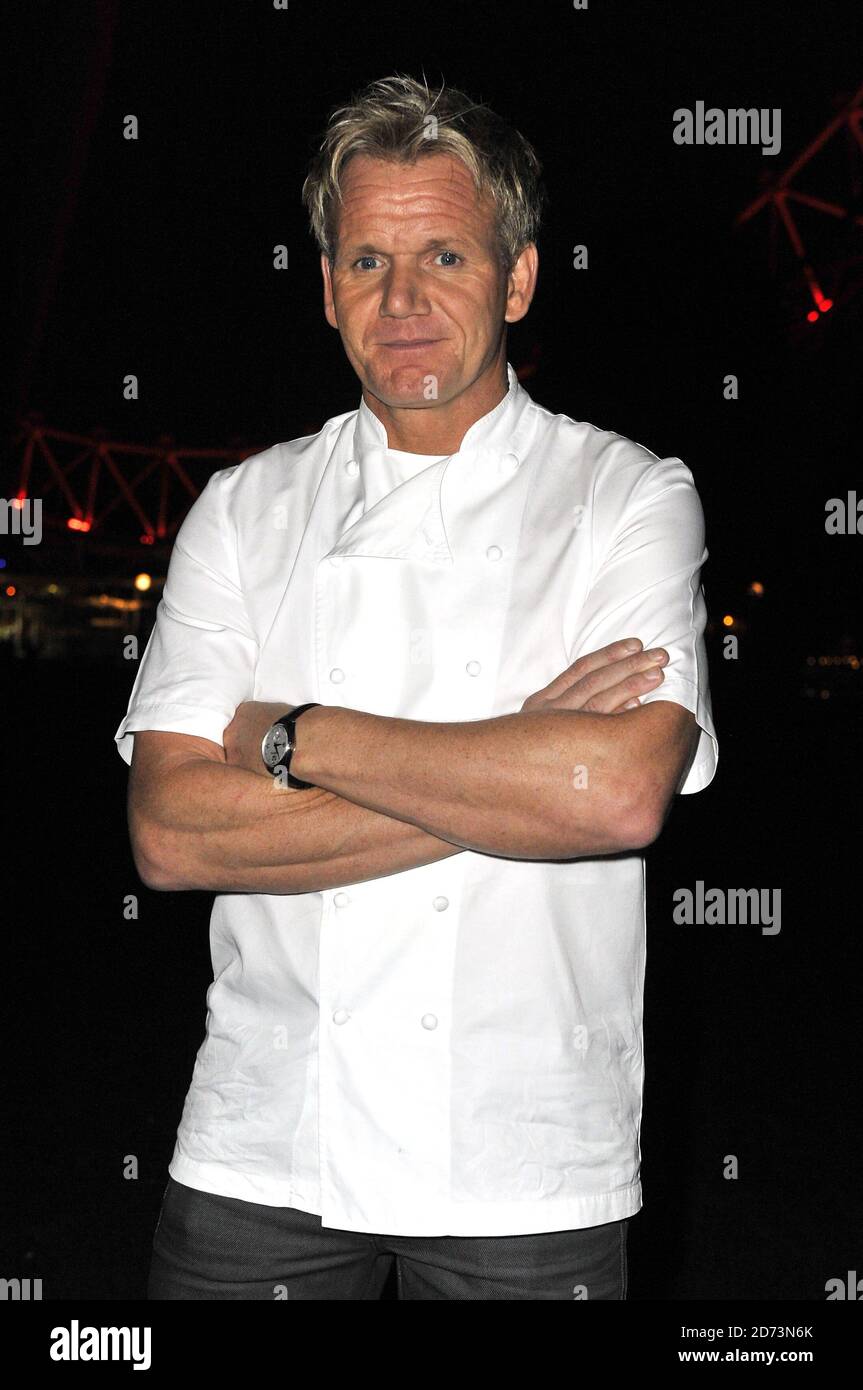 Gordon Ramsay poses for photographs in front of the London Eye in ...