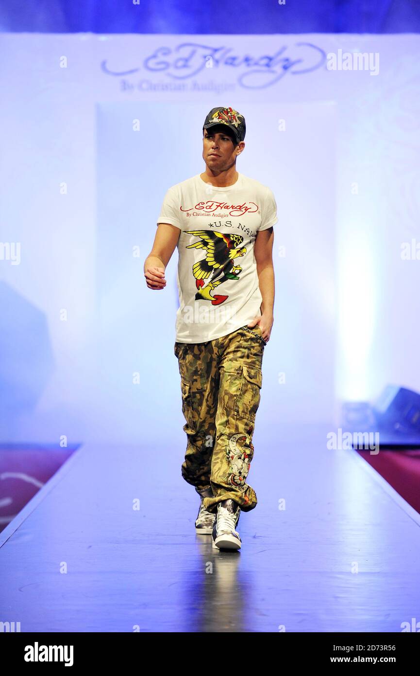 A model on the catwalk during the launch of the new Ed Hardy store in ...