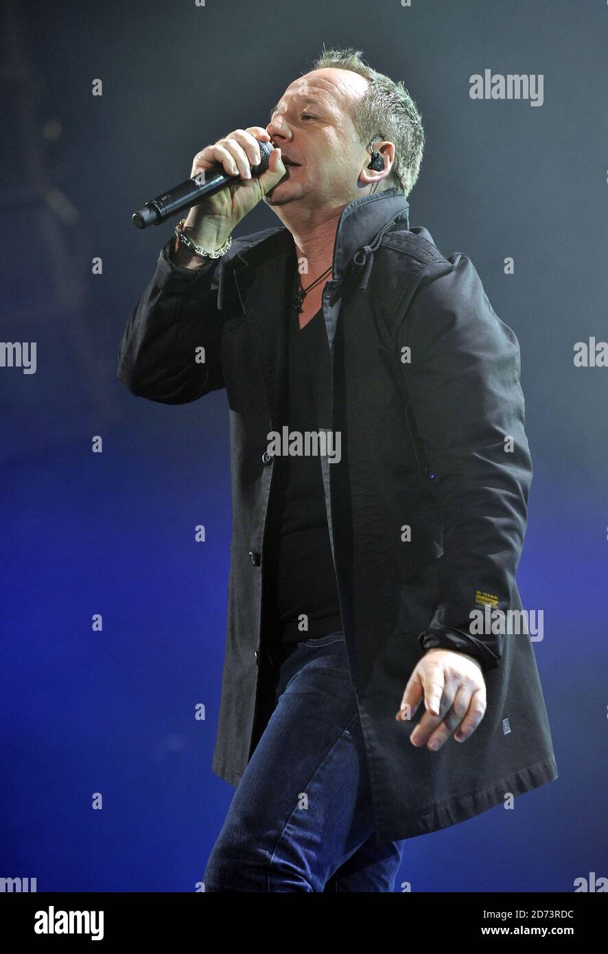 Jim Kerr of Simple Minds performs live at Wembley Arena in north London ...