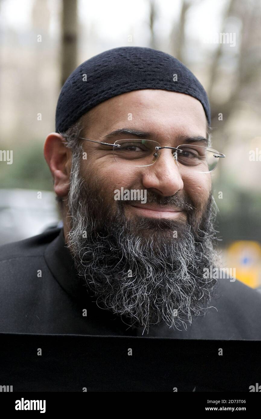Anjem Choudary (centre), of Islam4Uk, seen with supporters on Millbank ...