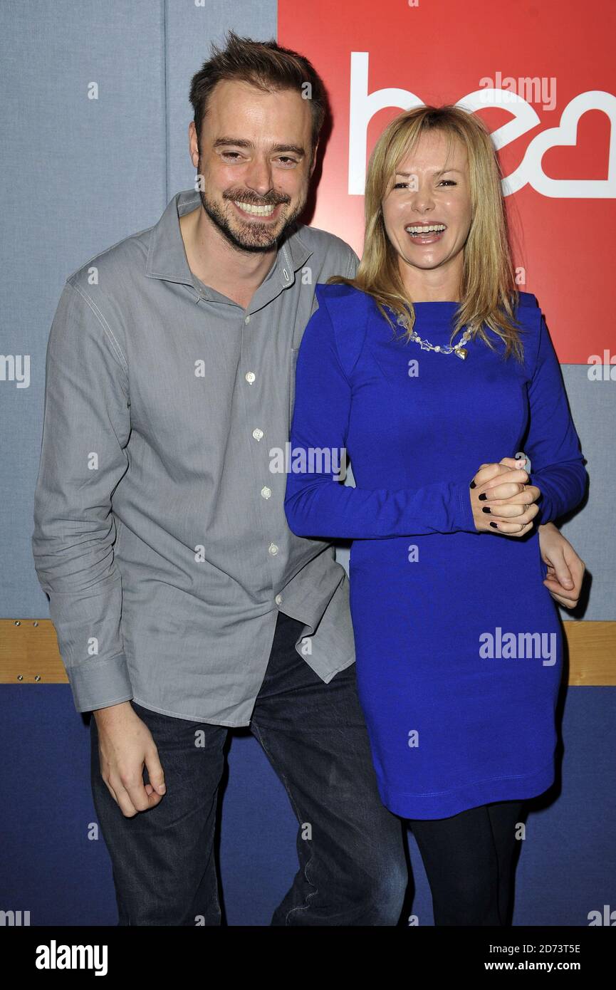 Amanda Holden poses for photographs with Jamie Theakston, after ...