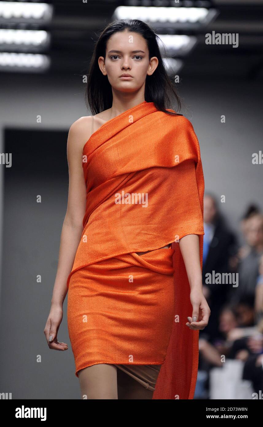 A model on the catwalk at the Mark Fast fashion show, held at the Top ...