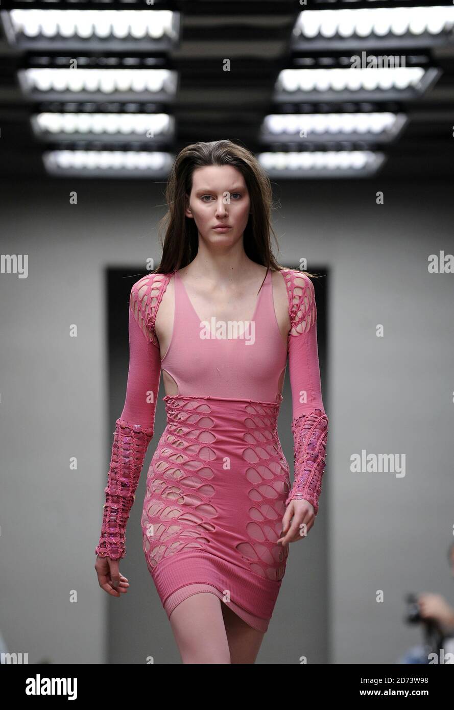 A model on the catwalk at the Mark Fast fashion show, held at the Top ...