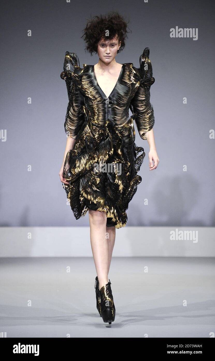 A model on the catwalk at the Iris Van Herpen fashion show, at the ...