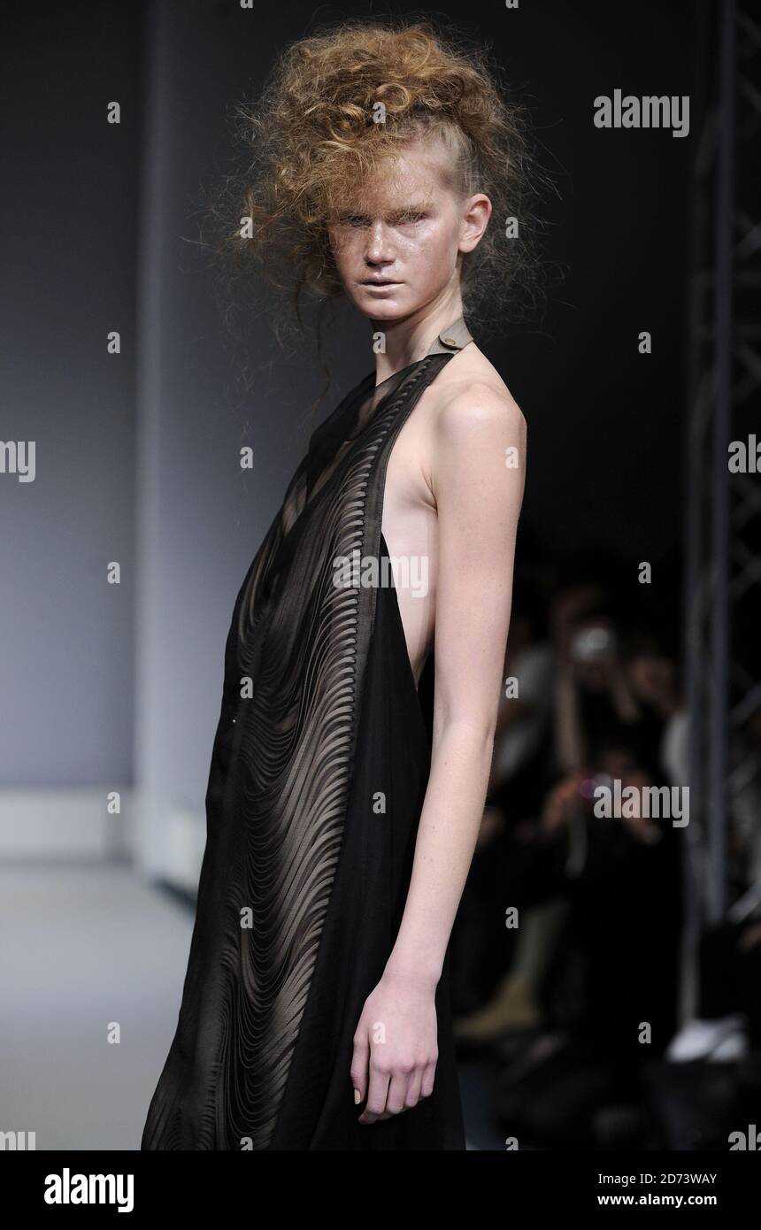 A model on the catwalk at the Iris Van Herpen fashion show, at the ...