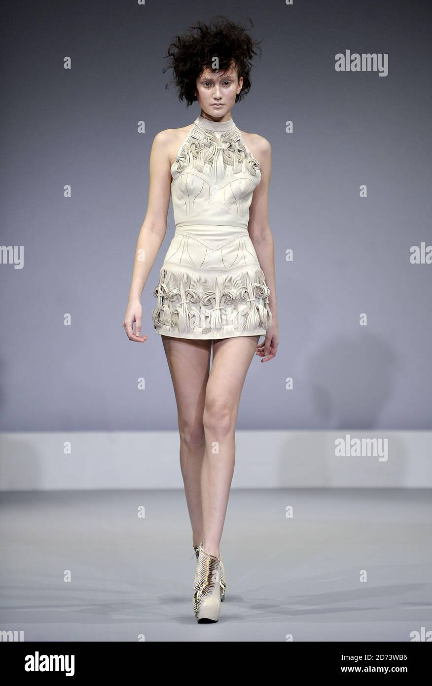 A model on the catwalk at the Iris Van Herpen fashion show, at the ...