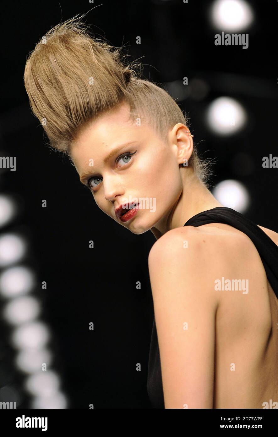 A model on the catwalk at the Issa fashion show, held at the BFC venue ...