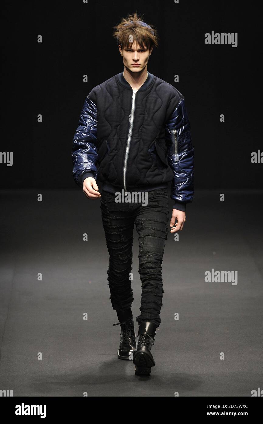 A model on the catwalk at the Top Man fashion show, held at the BFC ...