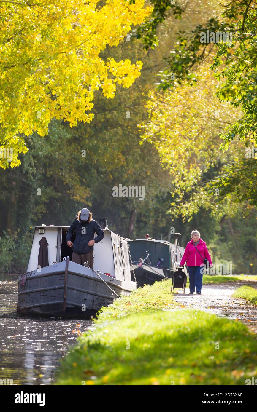 UK narrowboat on British canal in autumn sunshine Stock Photo - Alamy