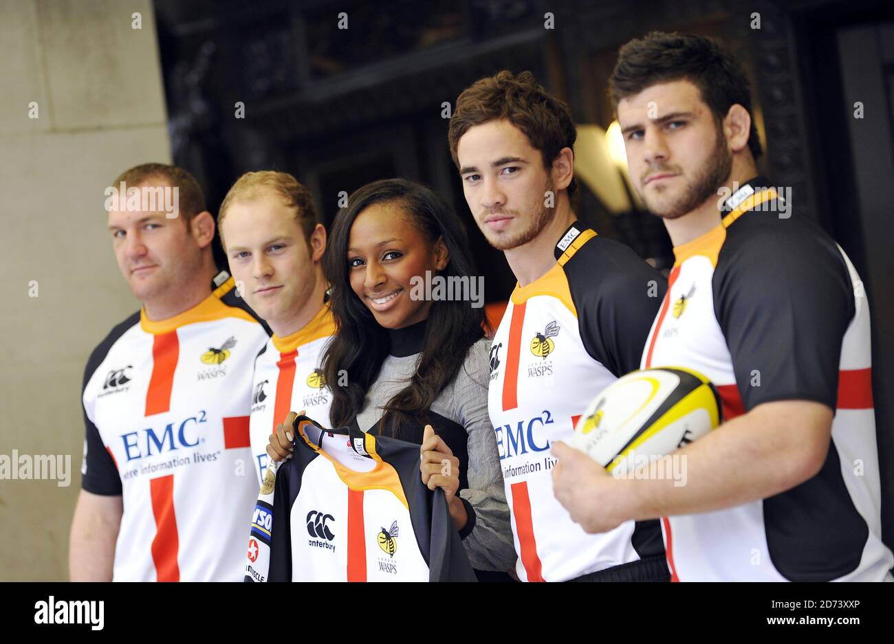 Alexandra Burke (centre) poses for photographs with (l-r) Tim Payne ...