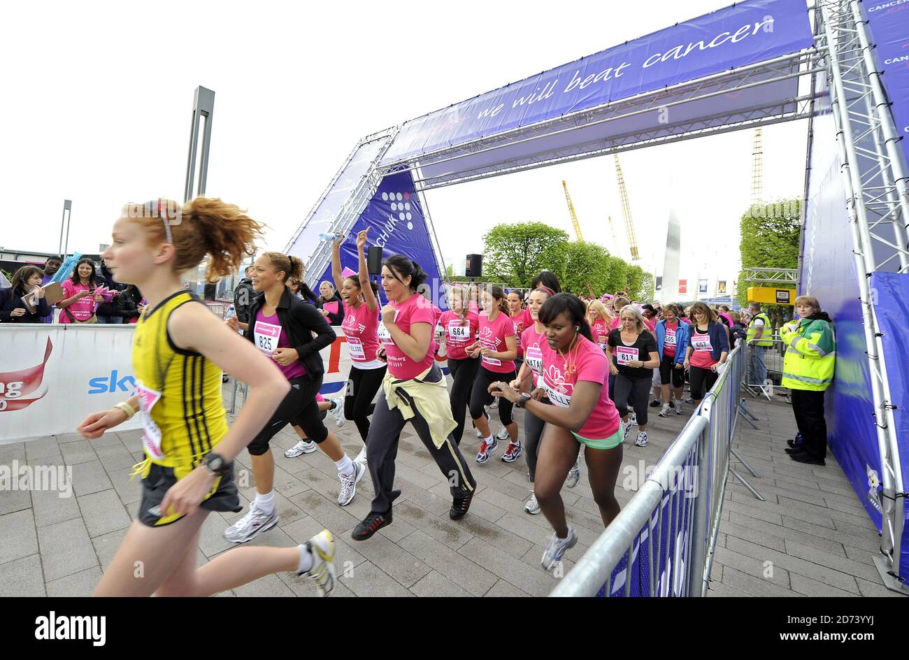 Runners set off at the start of Cancer Research UK's Race for Life, at ...