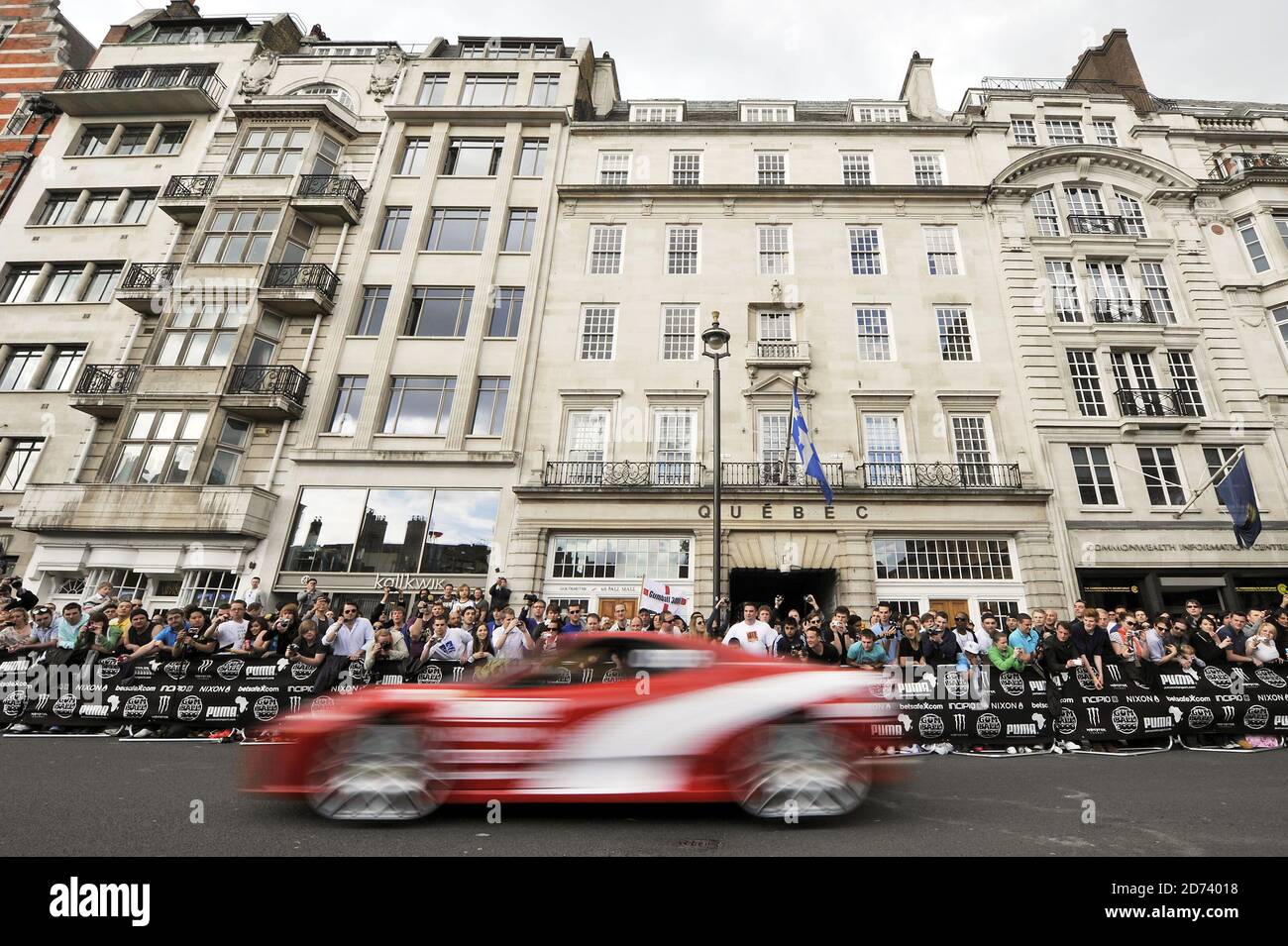 Cars cross the start line of the Gumball 3000 Rally, which saw over 100 ...