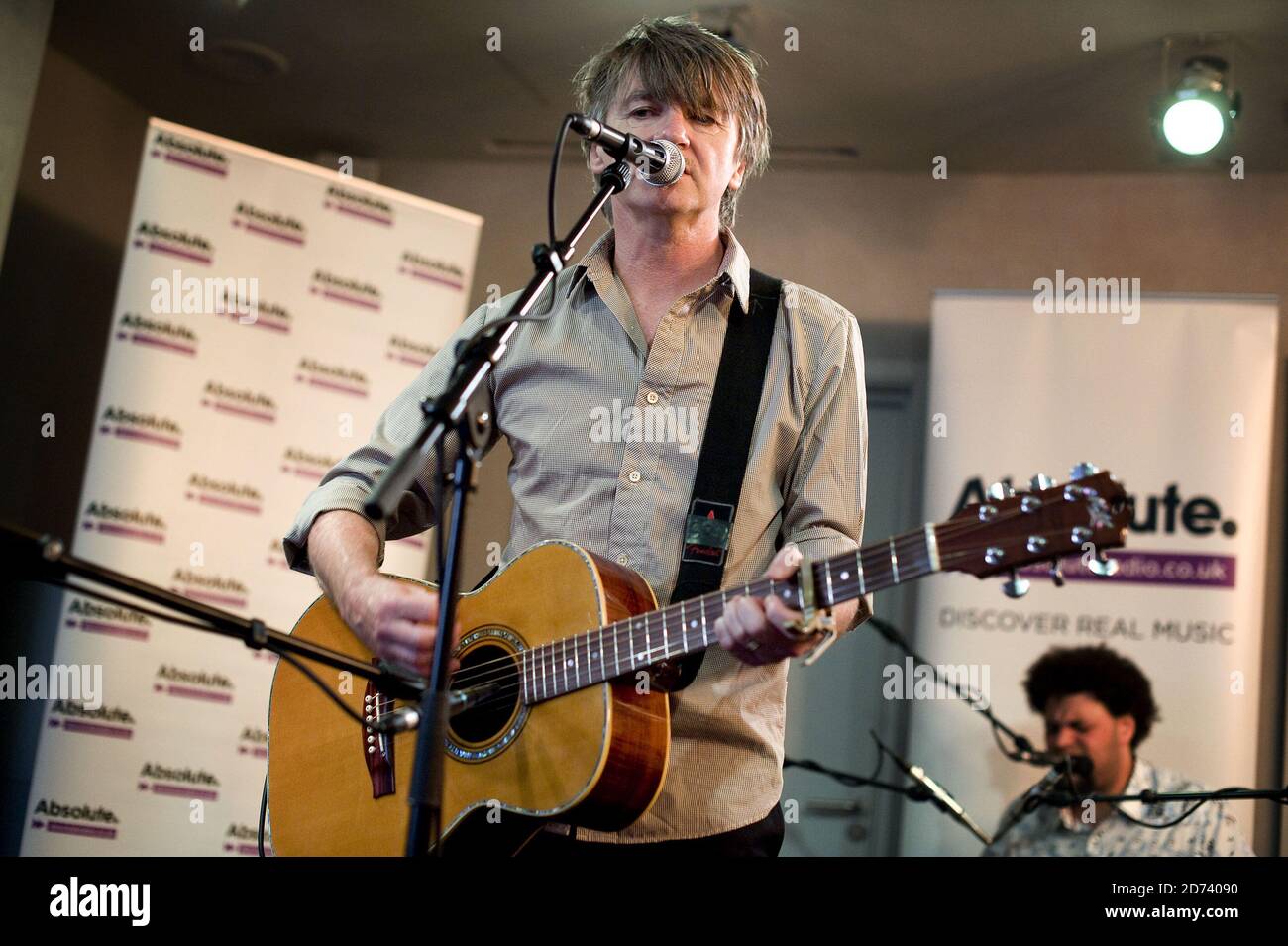 Neil Finn of Crowded House performs a live session at Absolute Radio in ...