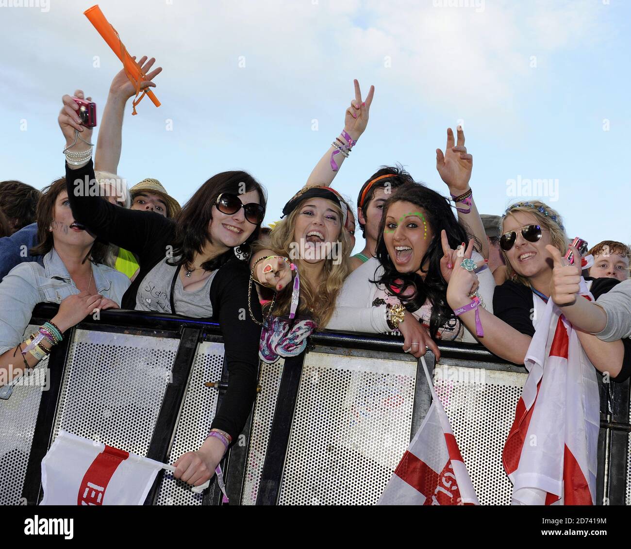 The crowd watch Calvin Harris at the Isle of Wight festival in Newport ...