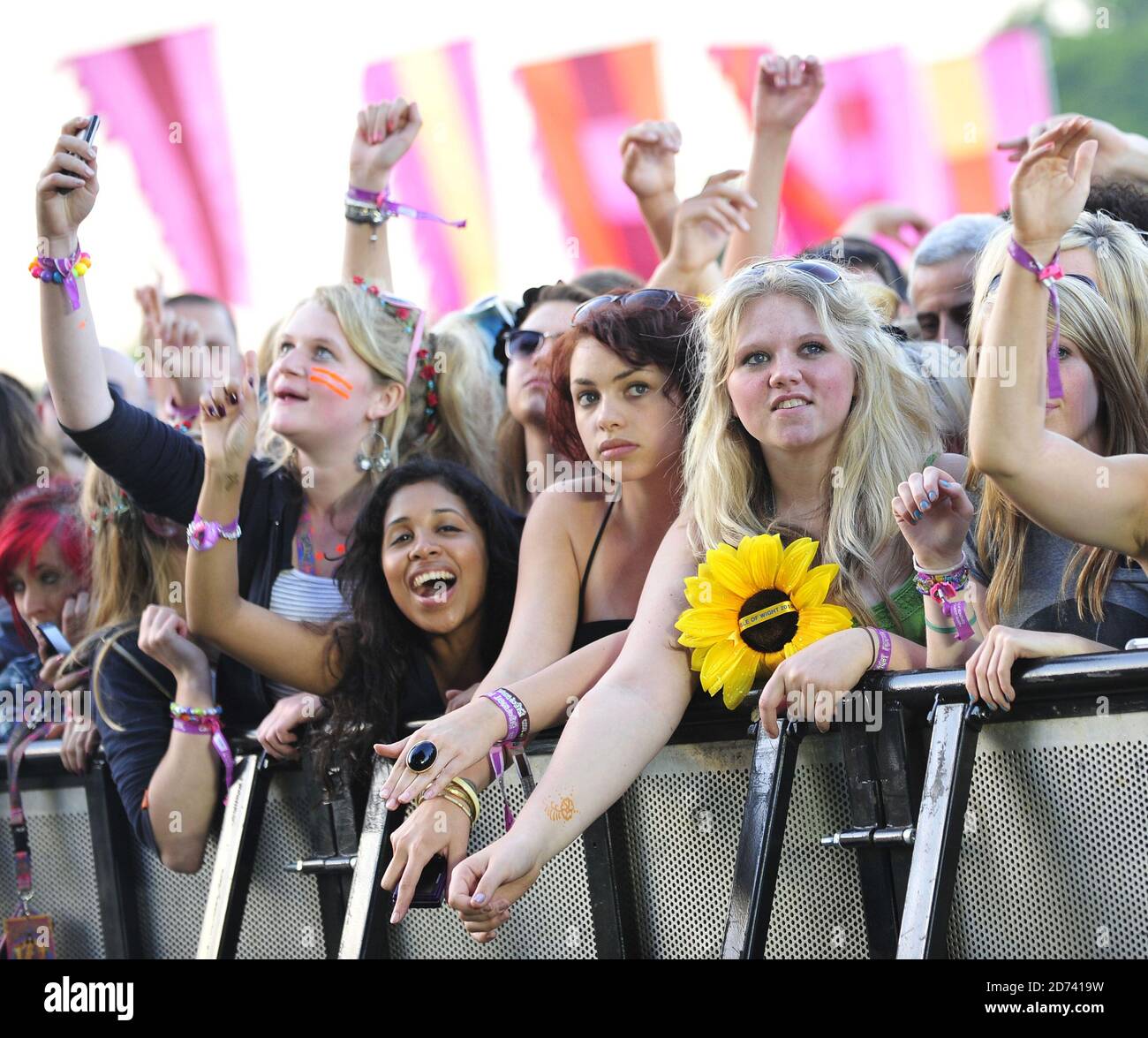 The crowd watch Calvin Harris at the Isle of Wight festival in Newport ...