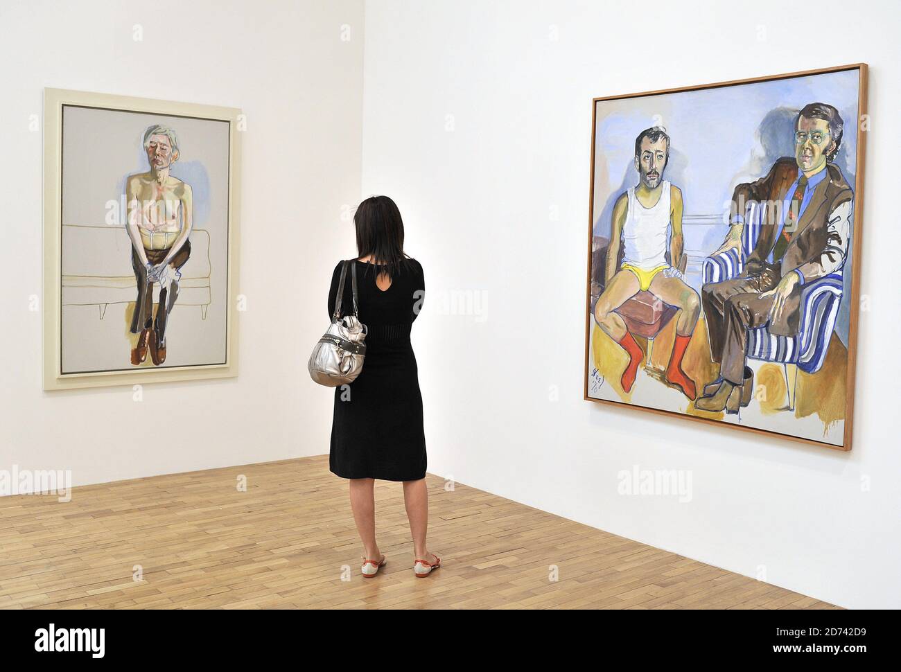 Visitors look at works by american artist Alice Neel, in the first ...