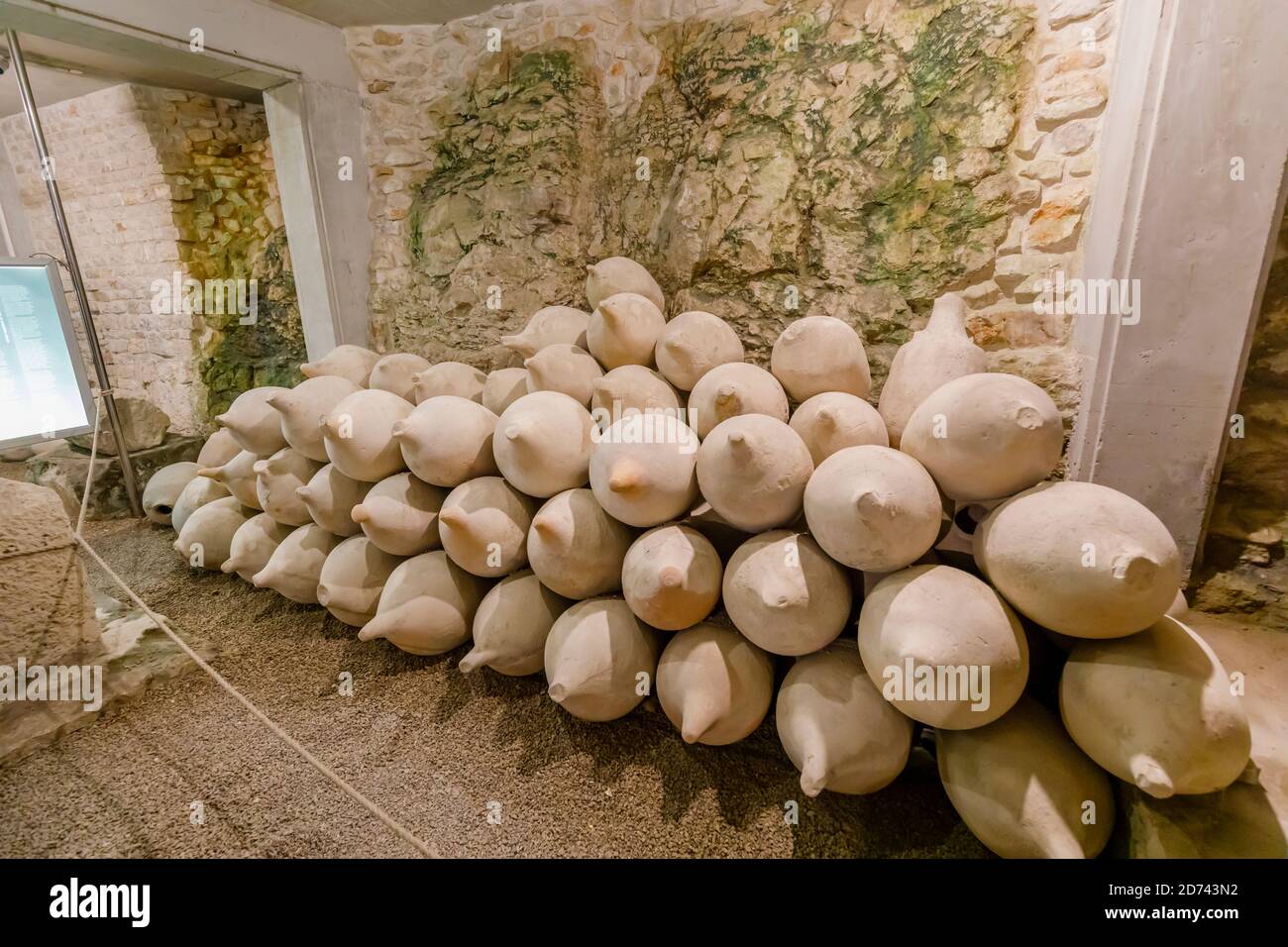 A pile of ceramic amphoras (storage jars), exhibits in the underground ...