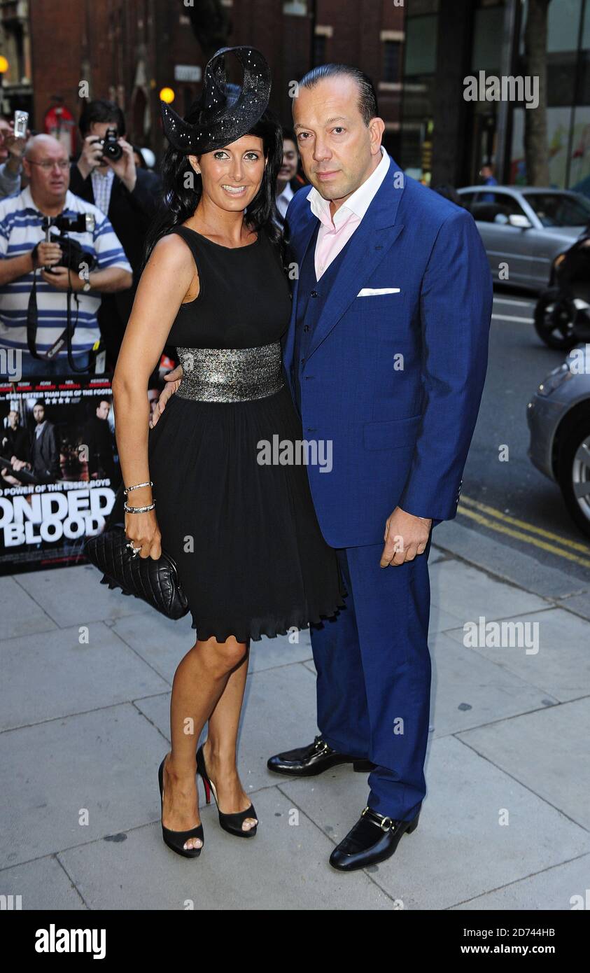 Terry Stone and guest arrive for the premiere of Bonded by Blood, at ...