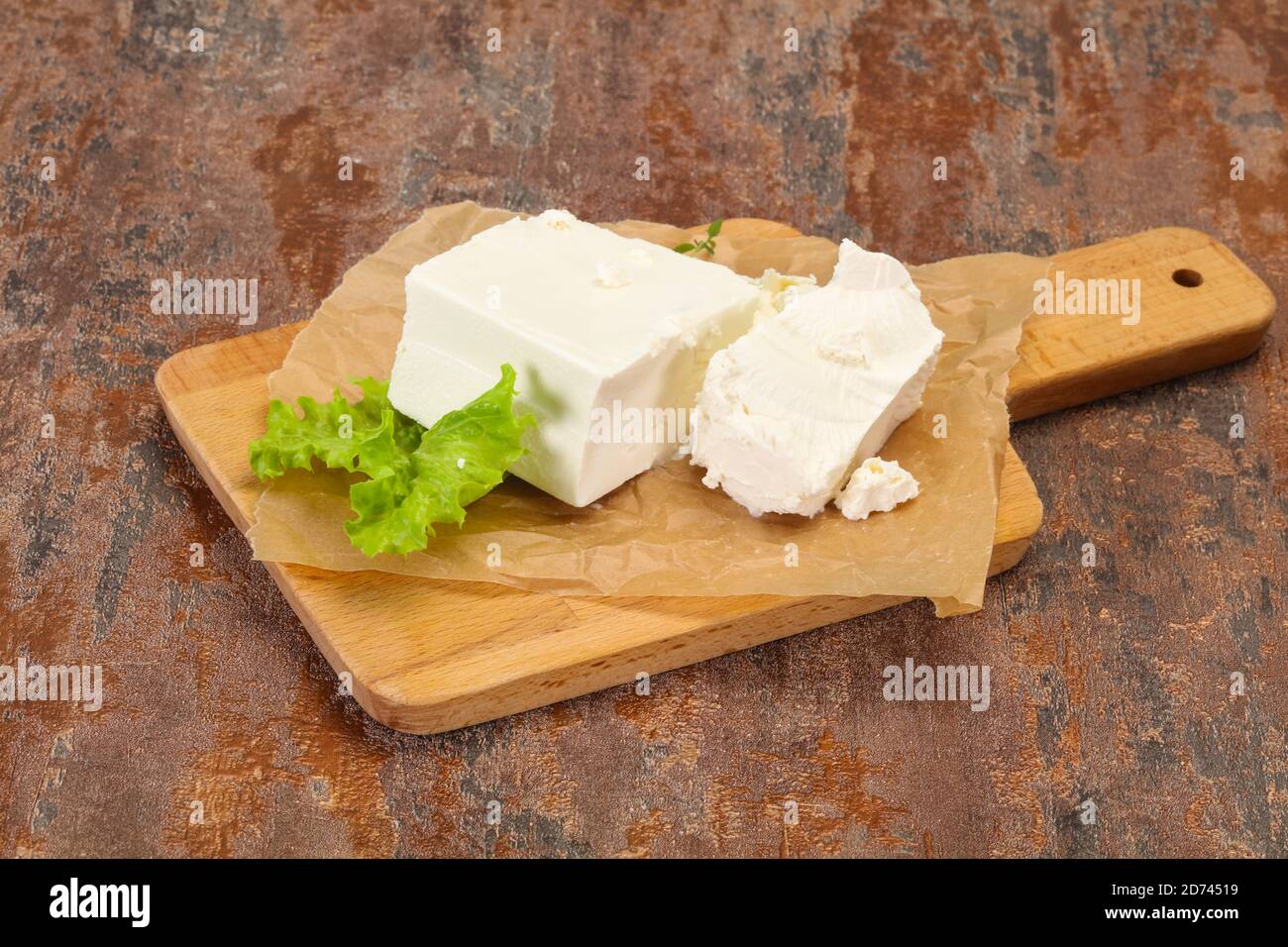 Greek traditional Feta soft cheese in the plate Stock Photo - Alamy