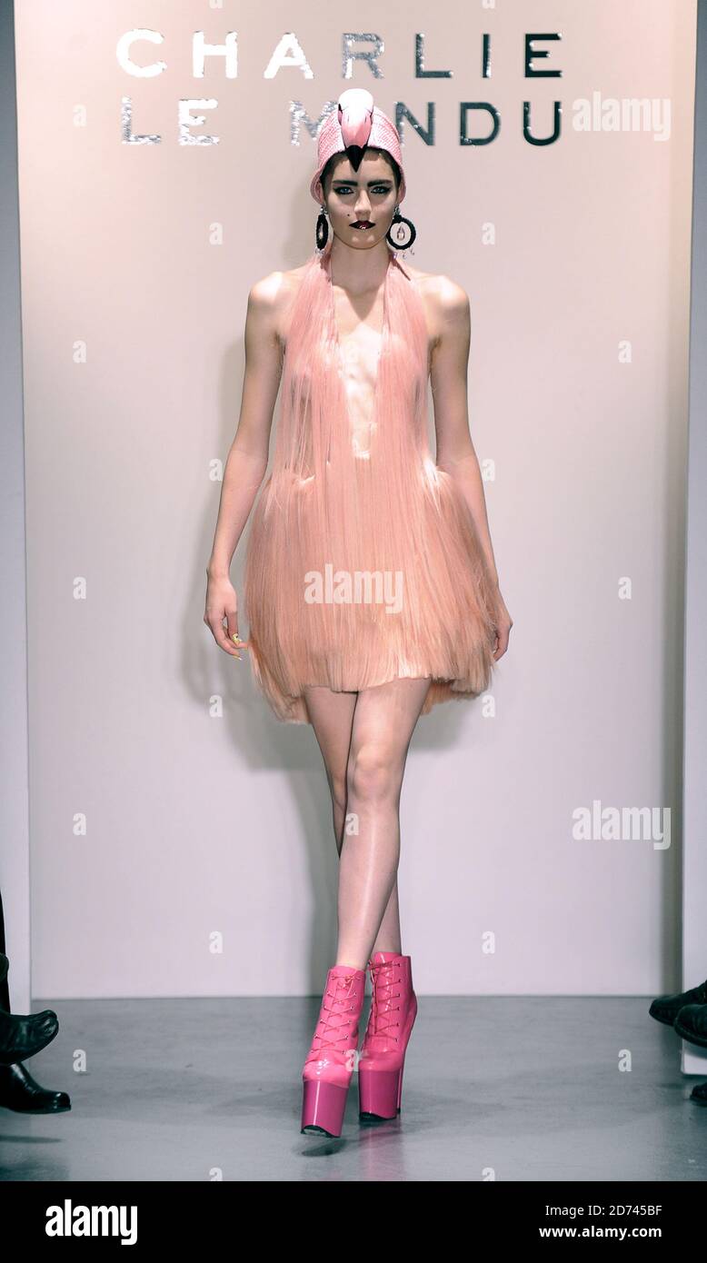 A model on the catwalk at the Charlie Le Mindu fashion show, held at ...