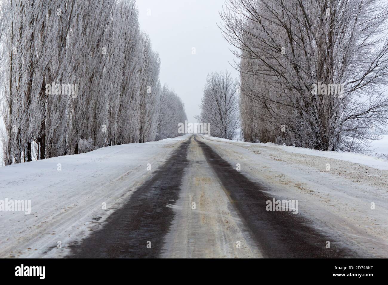 Winter snow road Stock Photo - Alamy