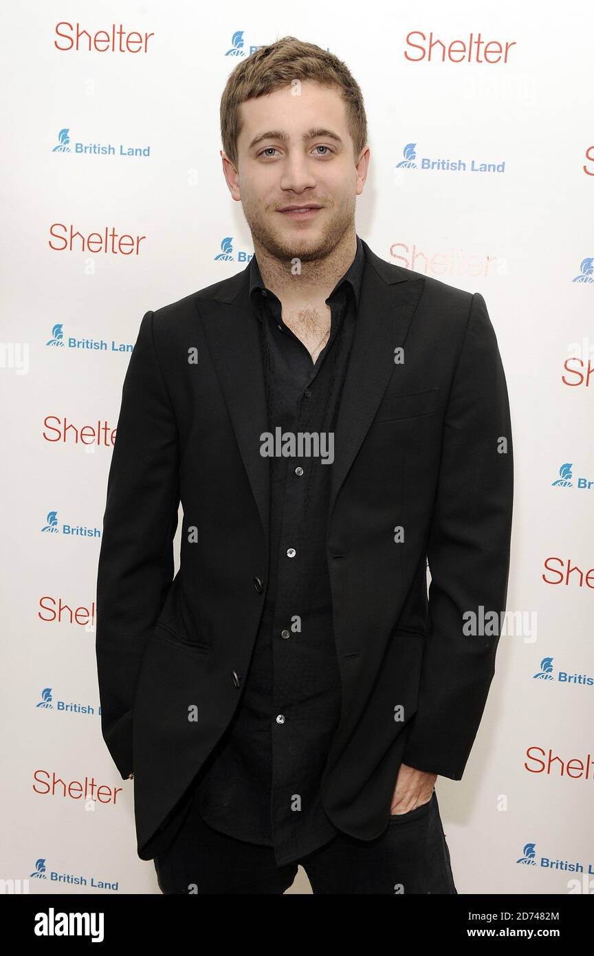 Tyrone Wood attending a charity auction at Shelter's 52 Weeks ...