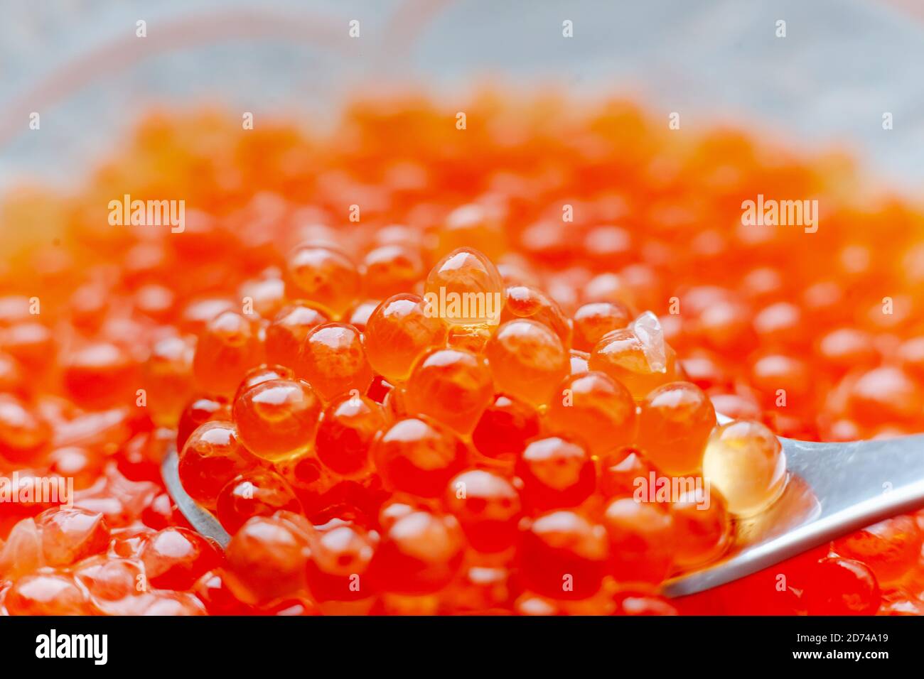 red caviar in a close-up spoon Stock Photo - Alamy