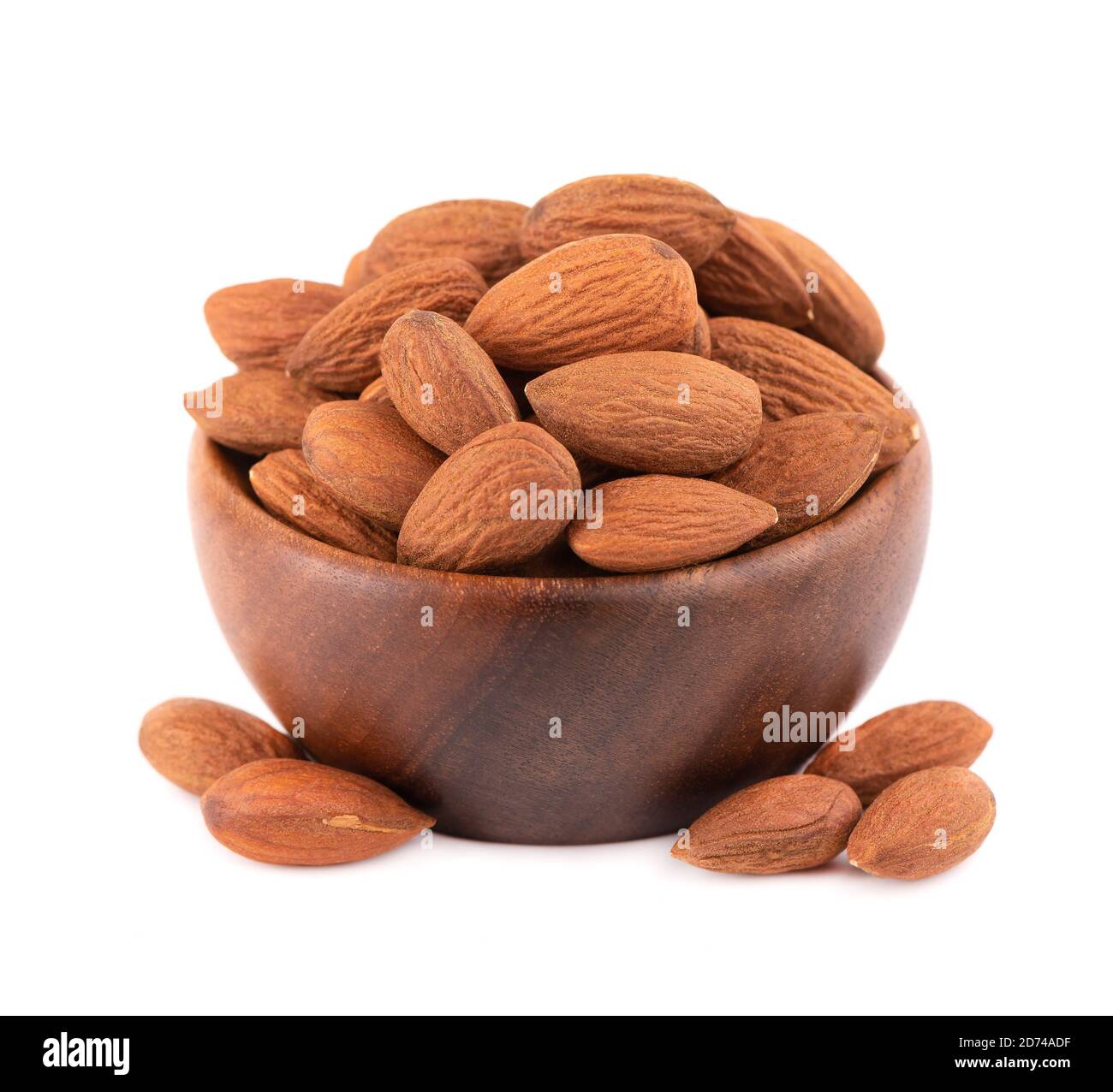 Almonds nuts in wooden bowl, isolated on white background. Pile of ...