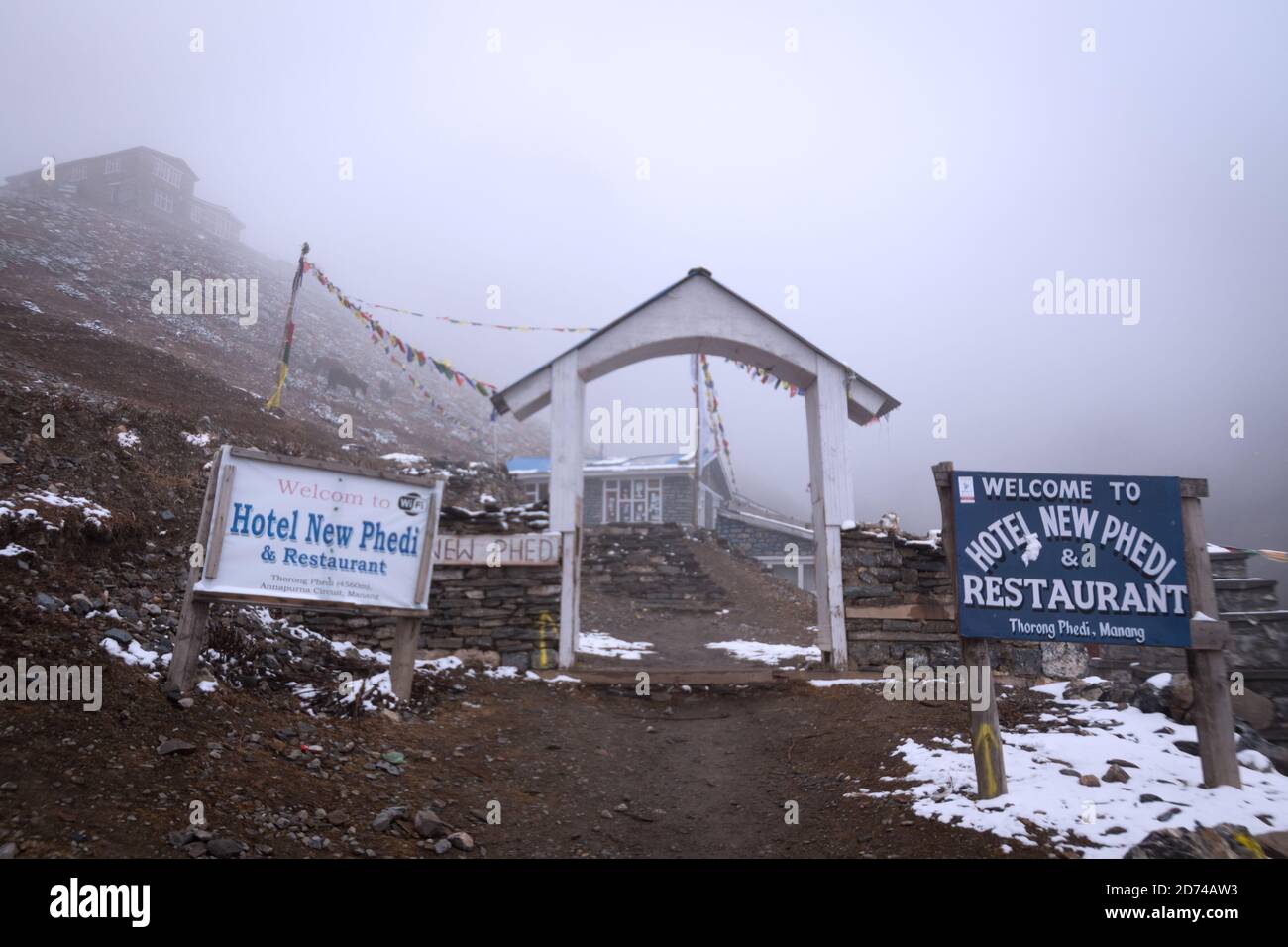 Nepal, Annapurna Circuit,Thorong Phedi camp. View of lodges on a cold ...
