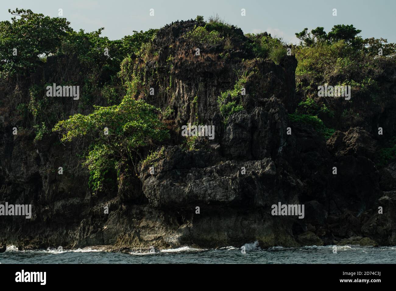 View of a steep cliff with trees growing on it by the Calventuras ...
