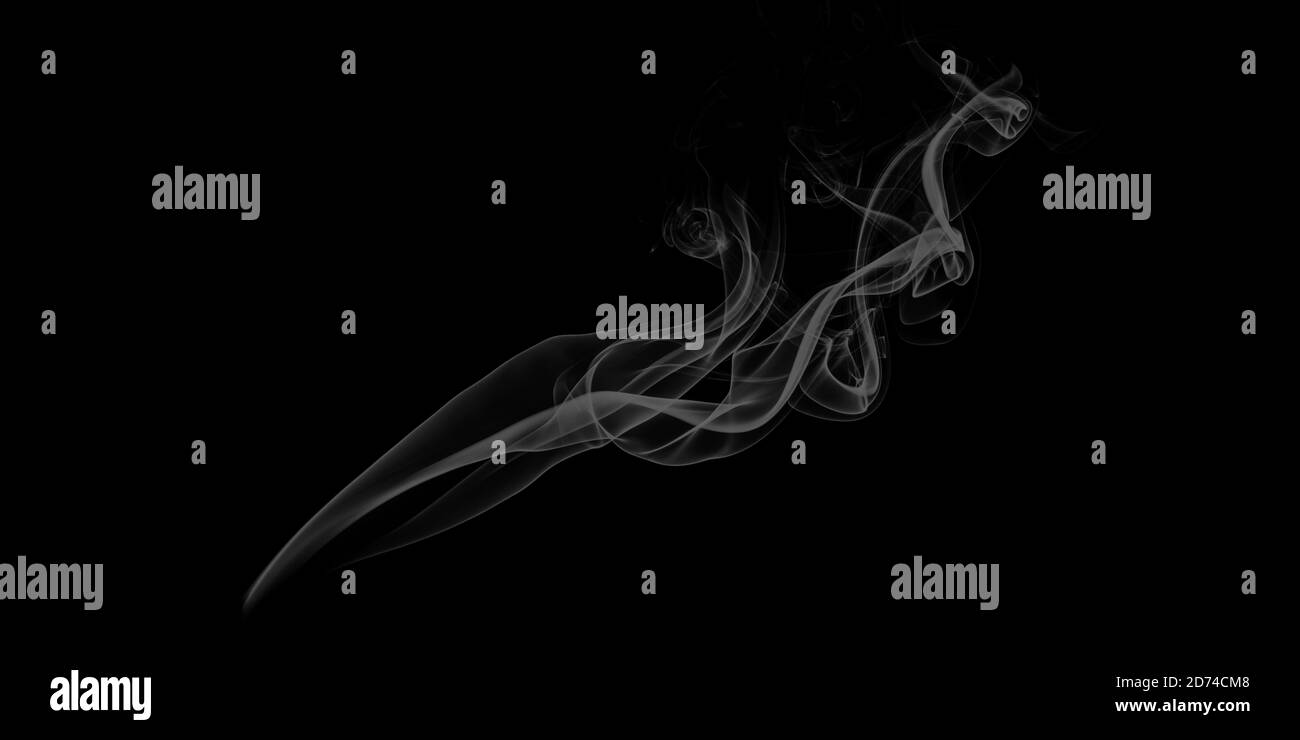 Abstract white puffs of smoke swirls overlay on black background ...