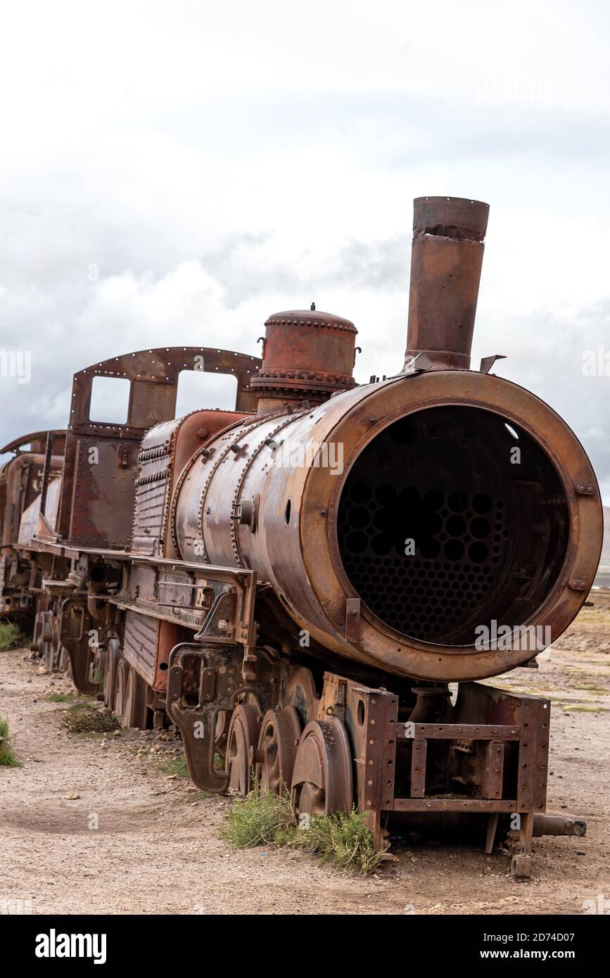 Old rusty locomotive abandoned in a train cemetery. Uyuni, Bolivia ...