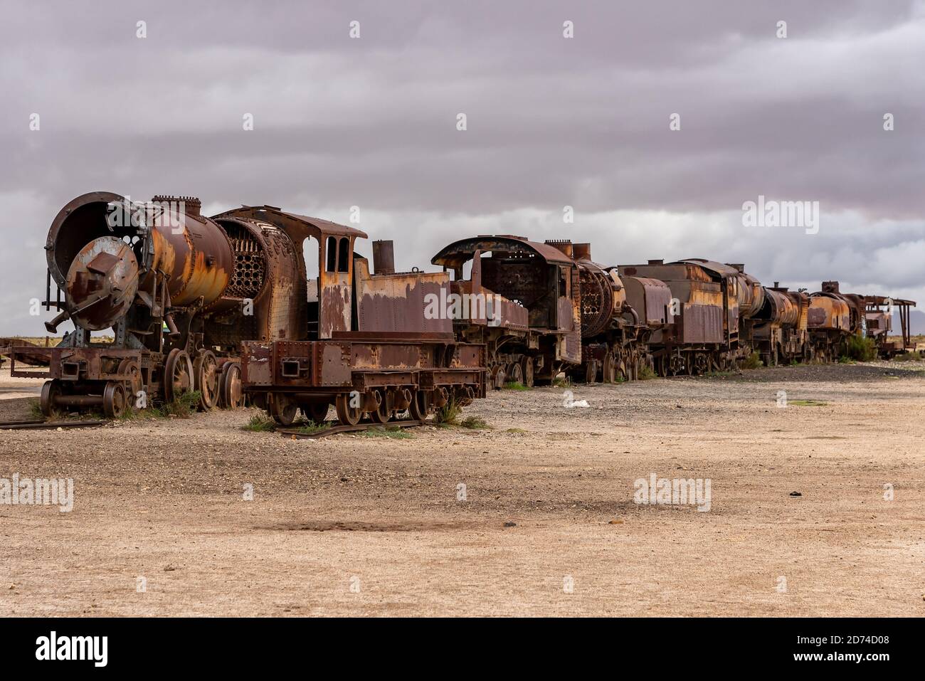 Old rusty locomotive abandoned in a train cemetery. Uyuni, Bolivia ...