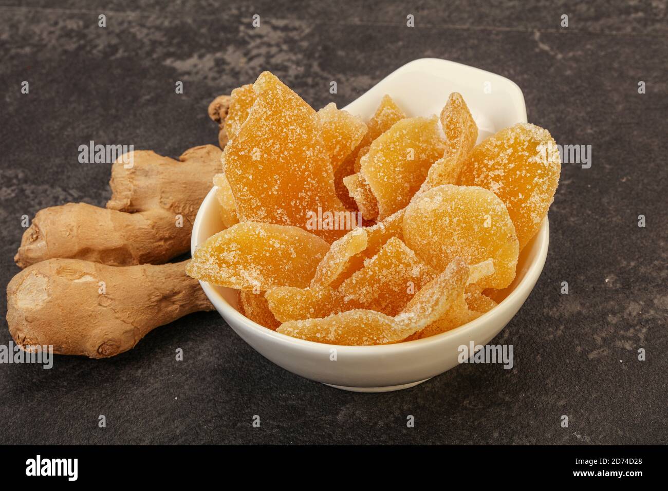 Dry sweet ginger snack in the bowl Stock Photo - Alamy