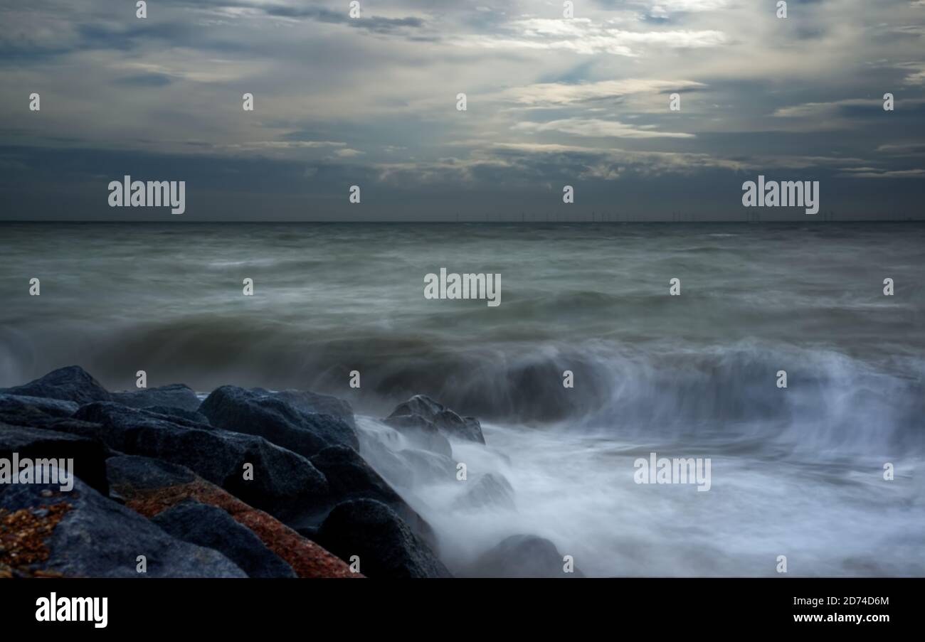 waves hitting rock long exposure Stock Photo - Alamy