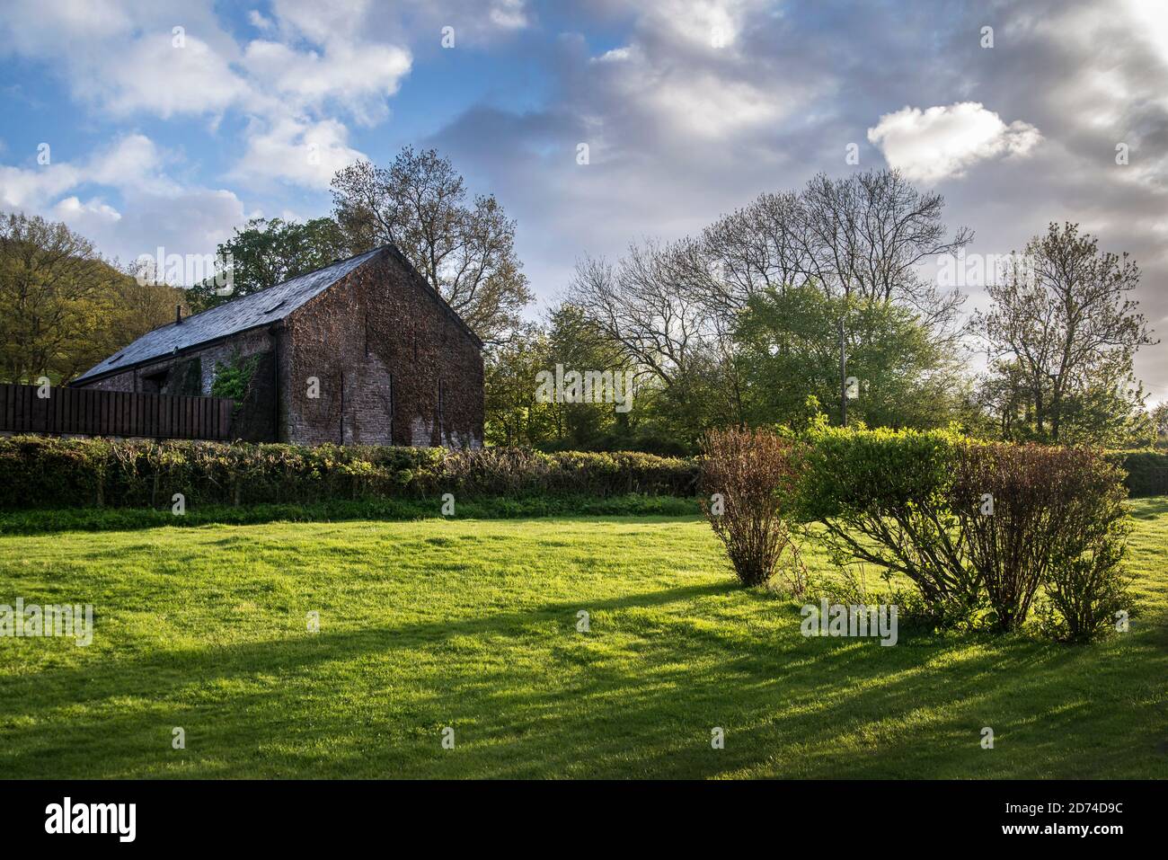 Rain clouds are forming as the sun starts to set in the Brecon Beacons ...