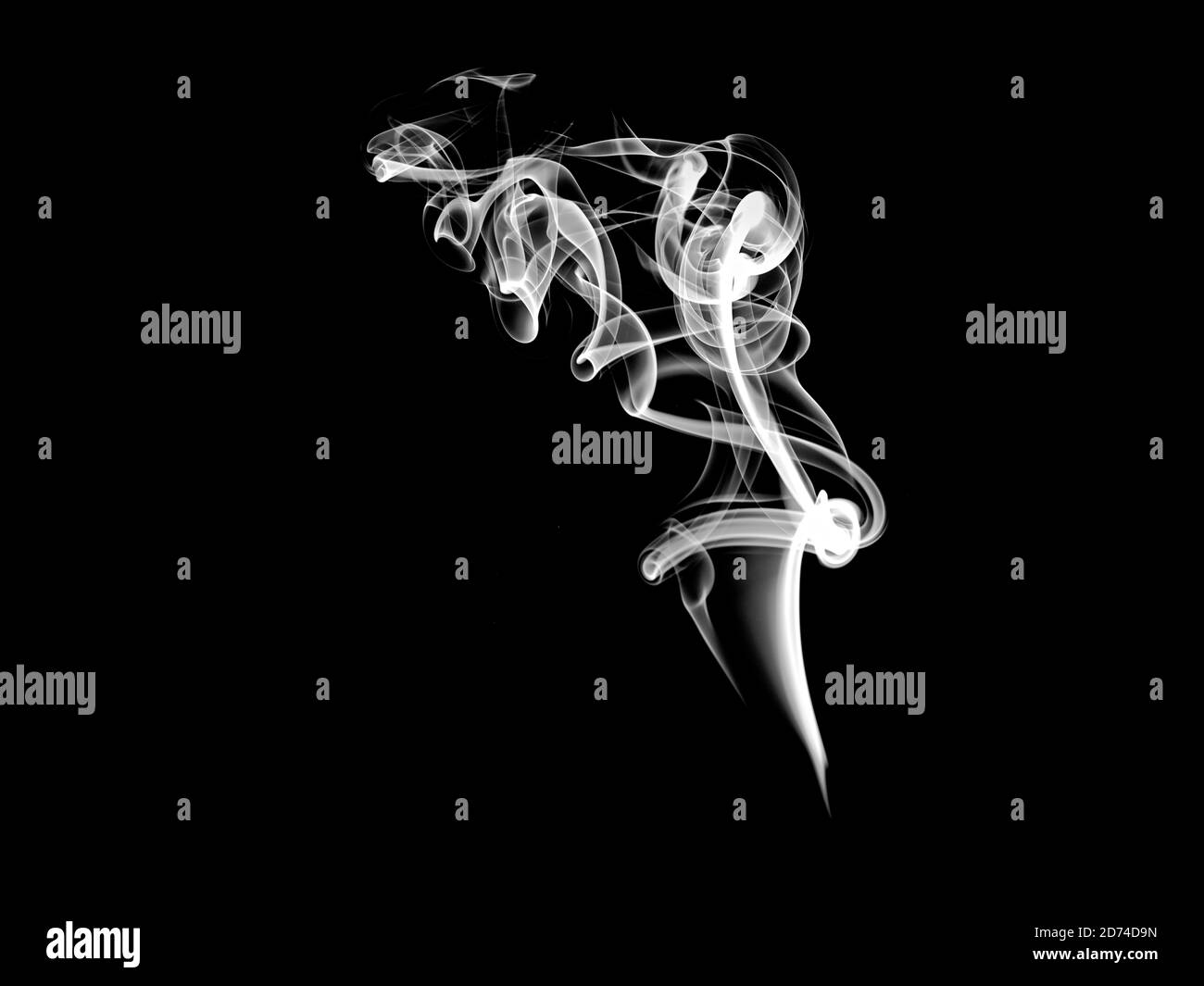 Abstract white puffs of smoke swirls overlay on black background ...