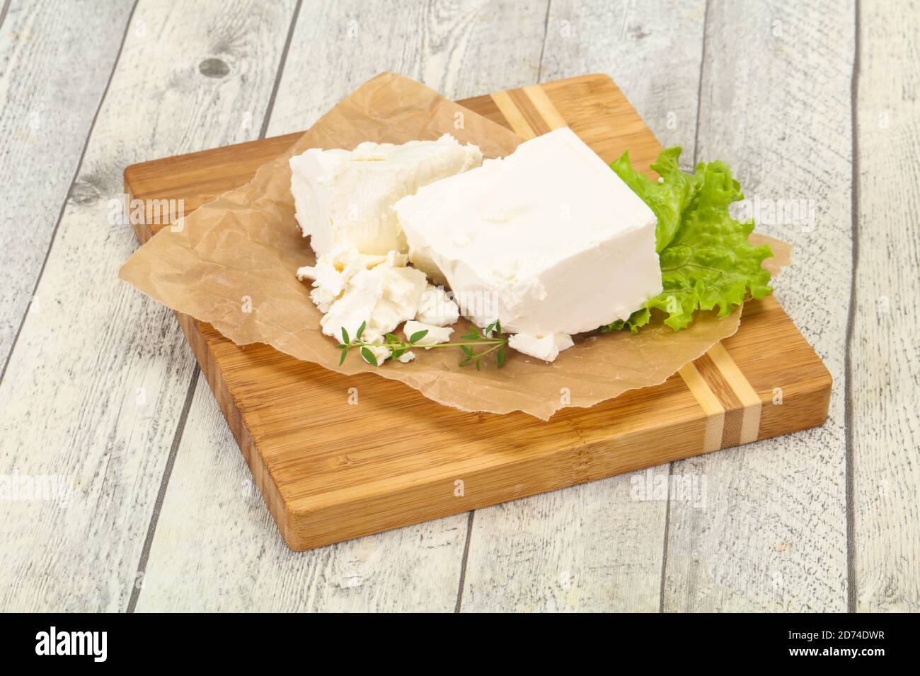 Greek traditional Feta soft cheese in the plate Stock Photo - Alamy