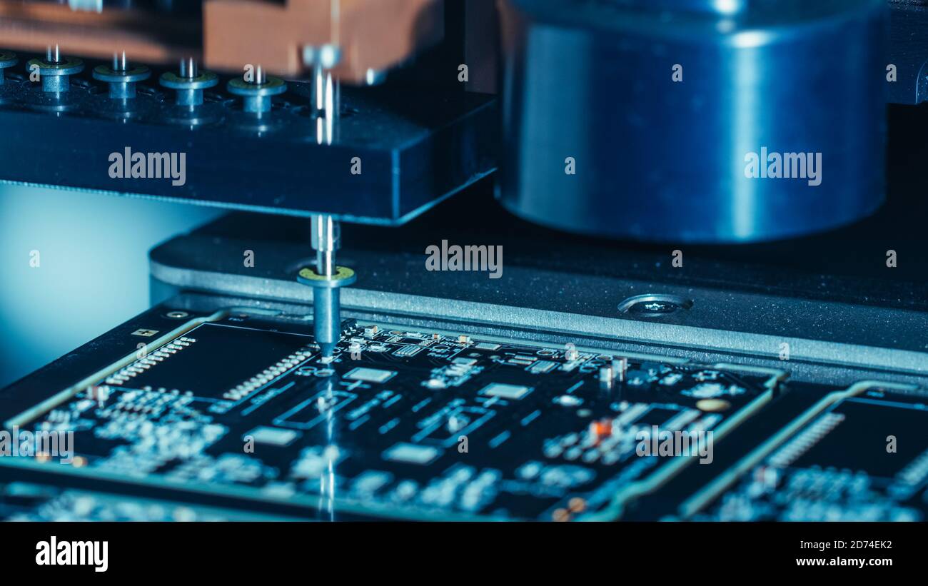 Close-up Macro Shot of Electronic Printed Circuit Board Being Assembled ...