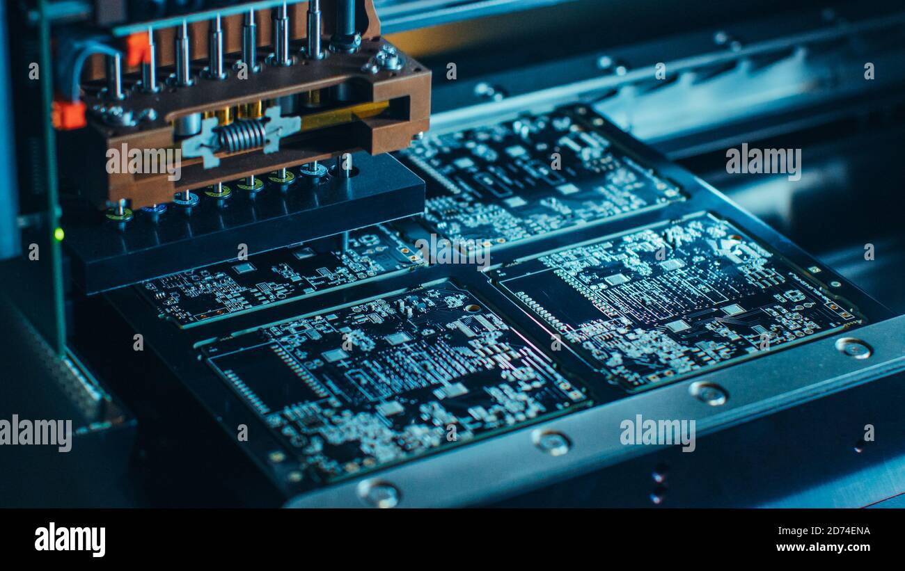 Close-up Macro Shot of Electronic Printed Circuit Board Being Assembled ...
