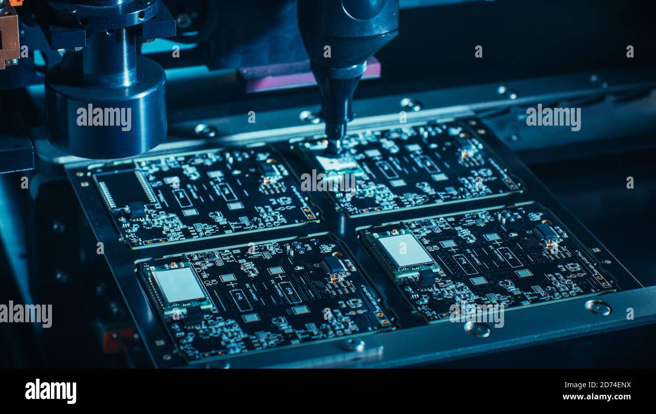 Macro Close-up Shot of Printed Circuit Board on a Factory Assembly Line ...