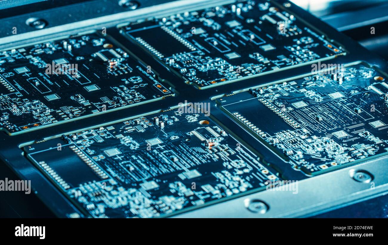 Factory Machinery at Work: Printed Circuit Board Being Assembled with ...