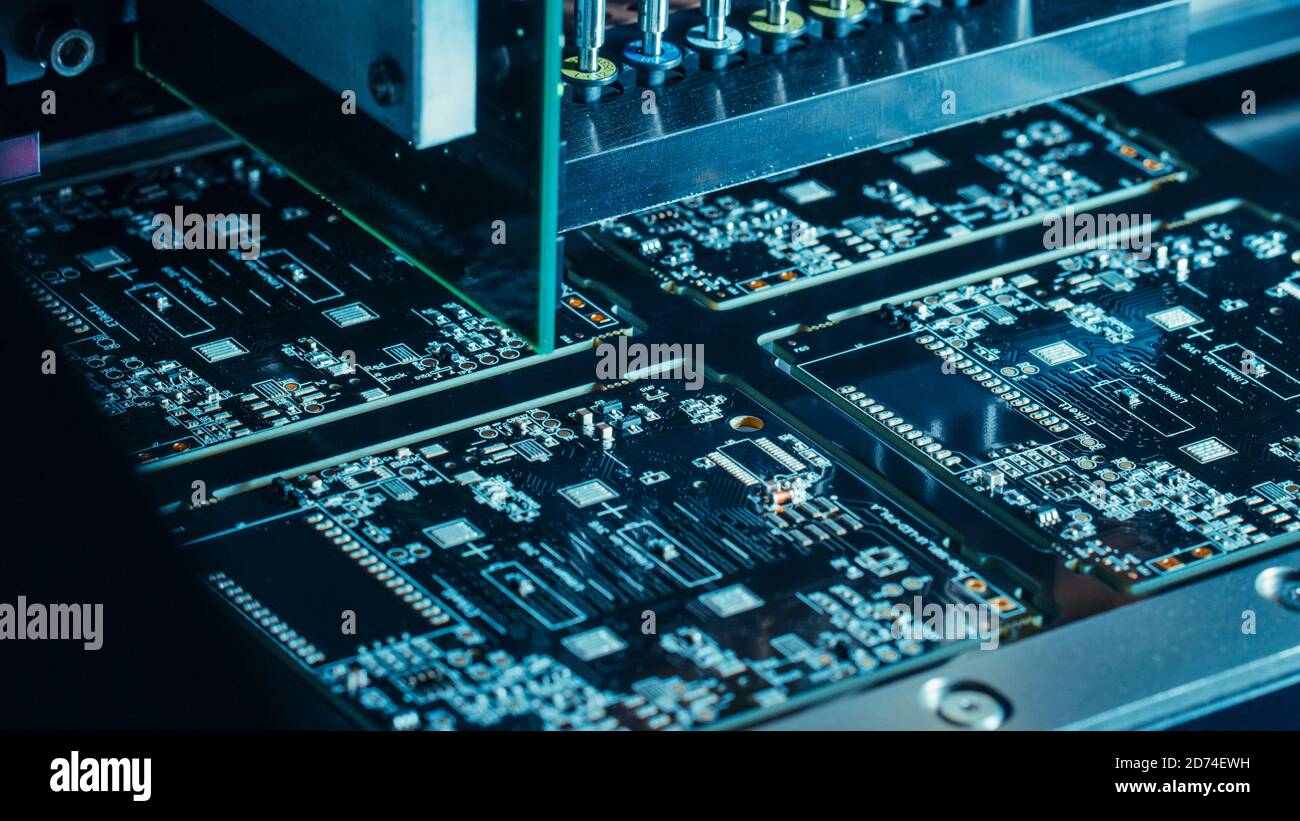 Factory Machine at Work: Electronic PCB Being Assembled with Automated ...