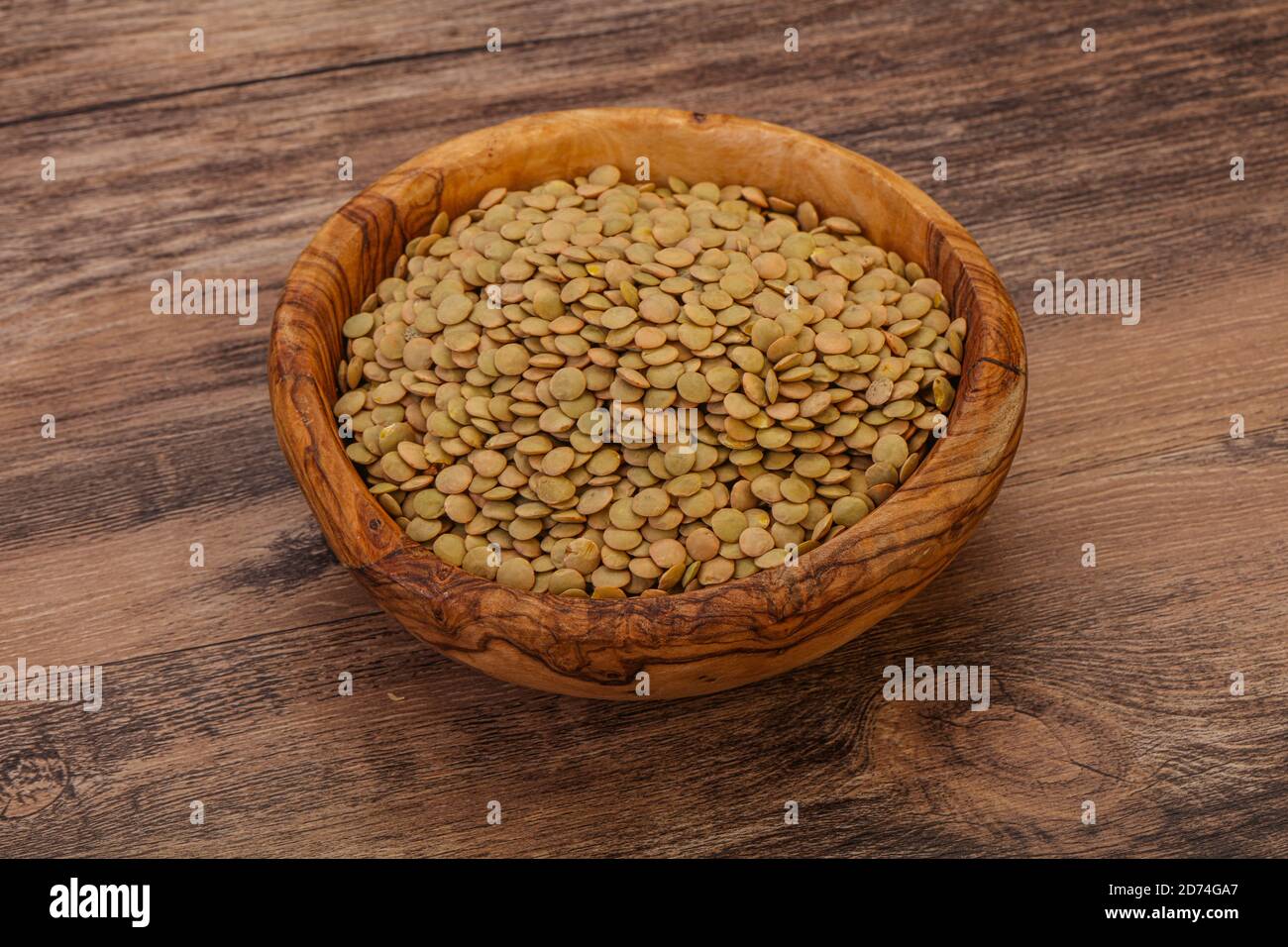 Vegan cuisine - Dry lentil heap isolated Stock Photo - Alamy